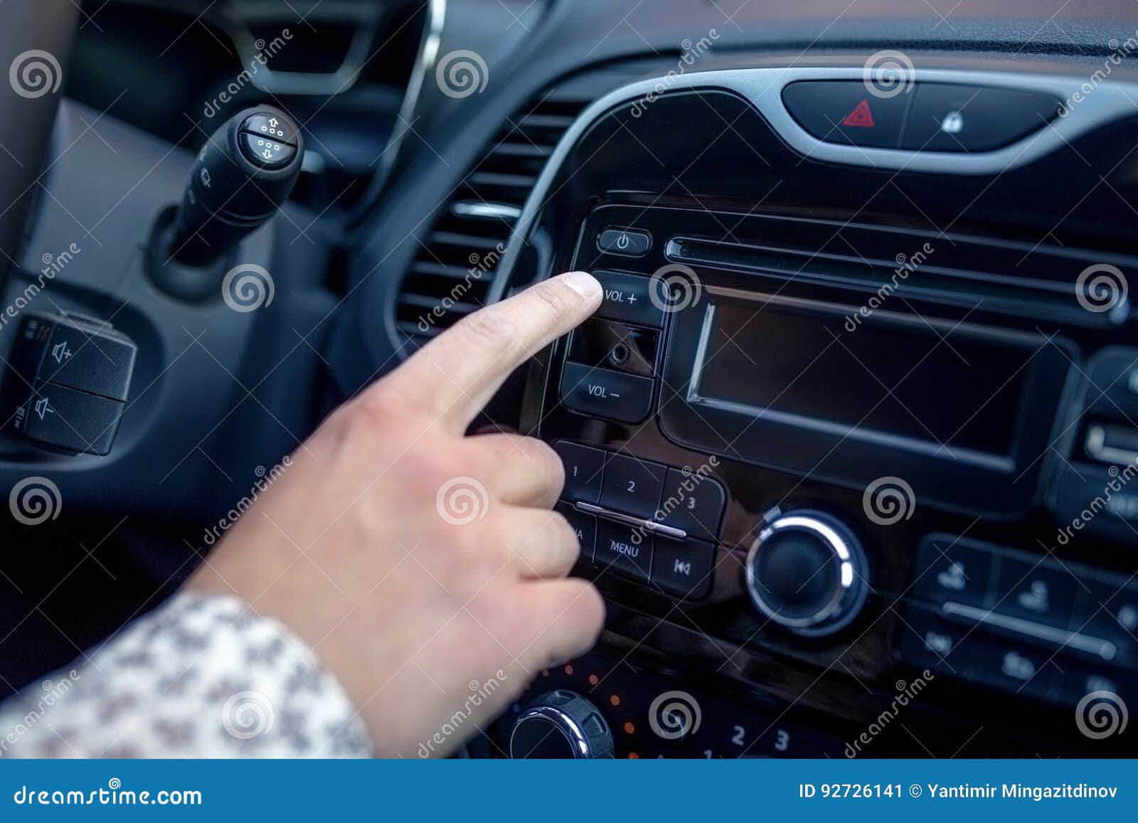A Man Pressing Button on Dashboard while Driving Car Stock Image ...