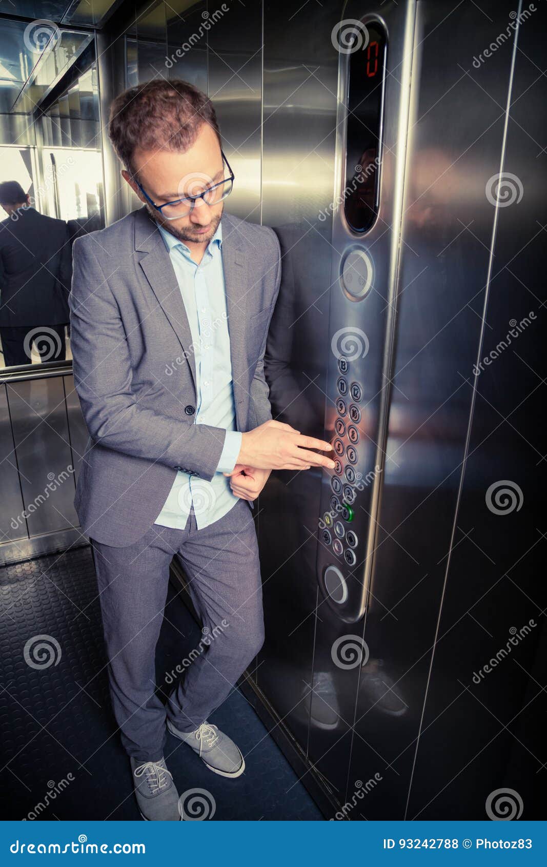 Man Pressing the Button in the Elevator Stock Photo - Image of lift ...