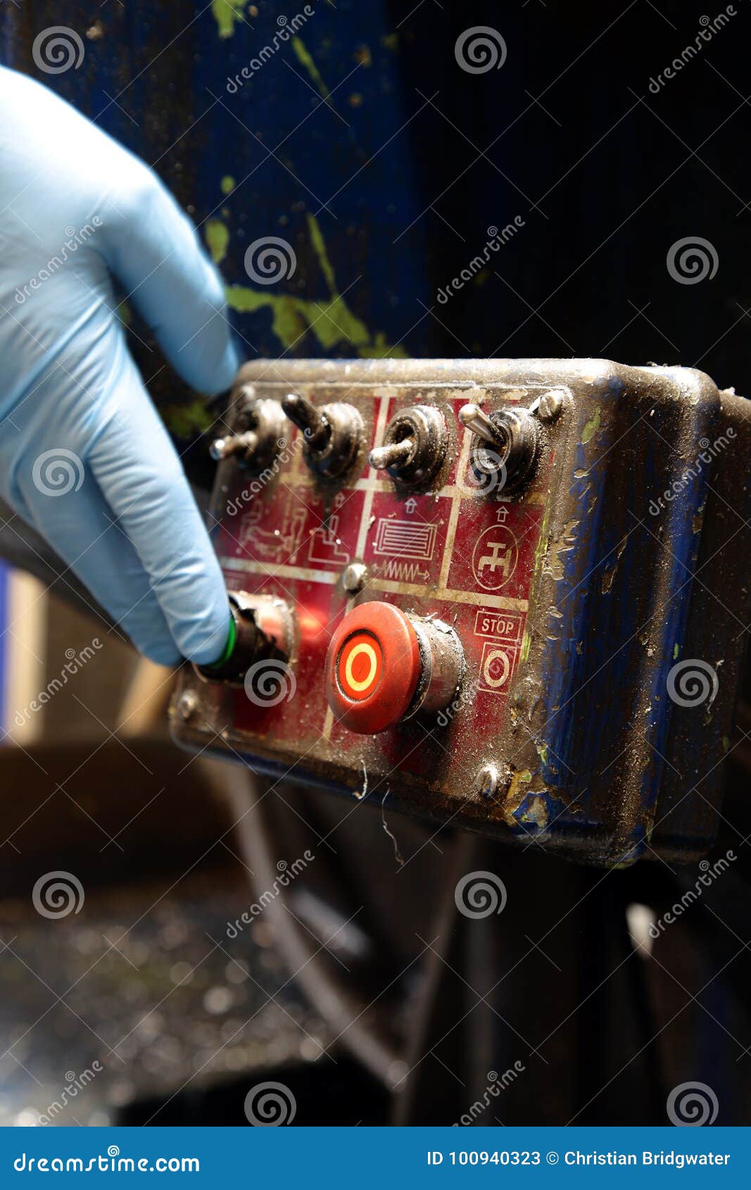 Man Pressing Button on an Industrial Machine Stock Image - Image of ...