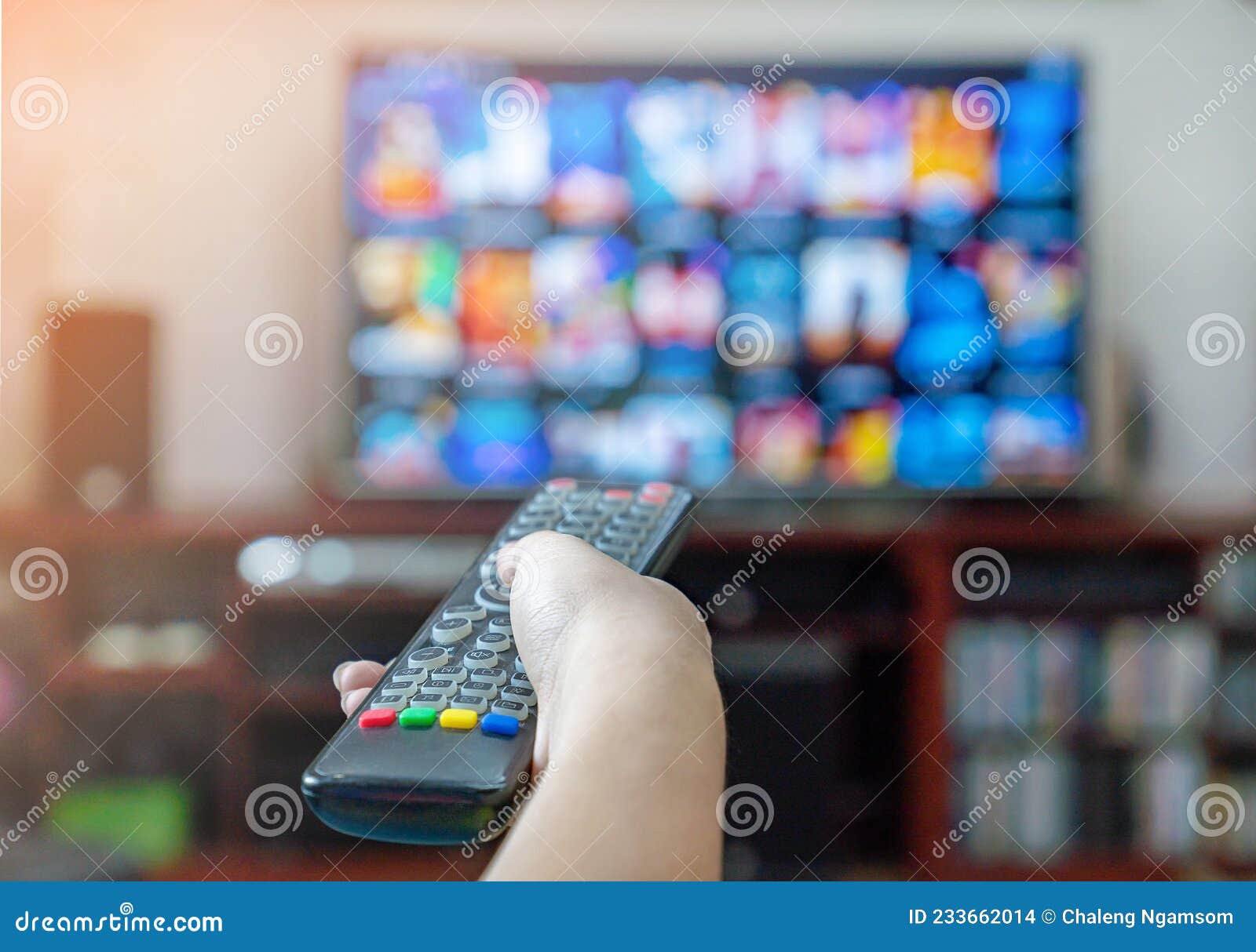 The Man Pressing Button on TV Remote Control Stock Photo - Image of ...