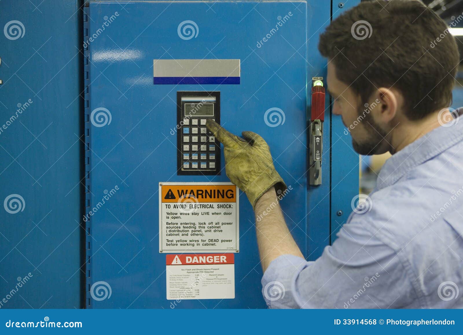 Man Pressing Keypad in Factory Stock Photo - Image of control, danger ...