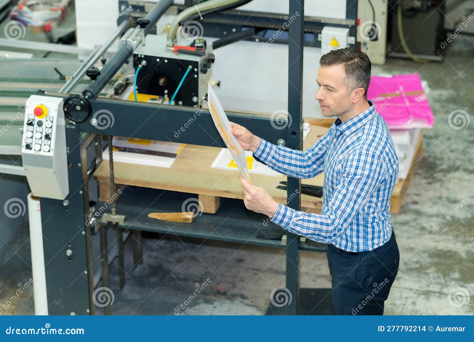Man in printing factory stock photo. Image of technology - 277792214