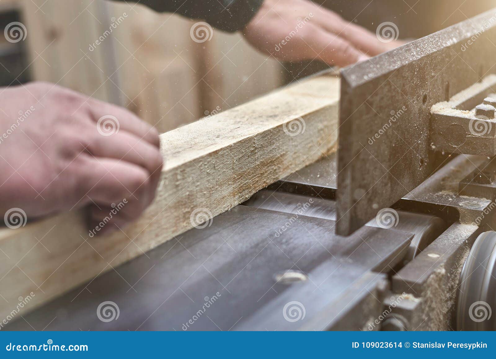 The Man Processes Bar from a Light Tree on the Jointer Plane Stock ...