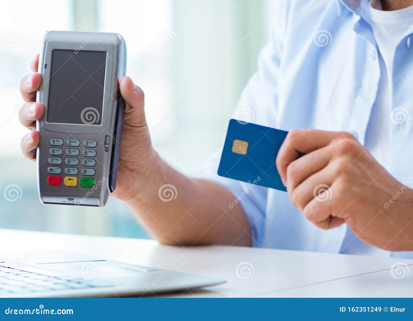 Man Processing Credit Card Transaction with POS Terminal Stock Image ...