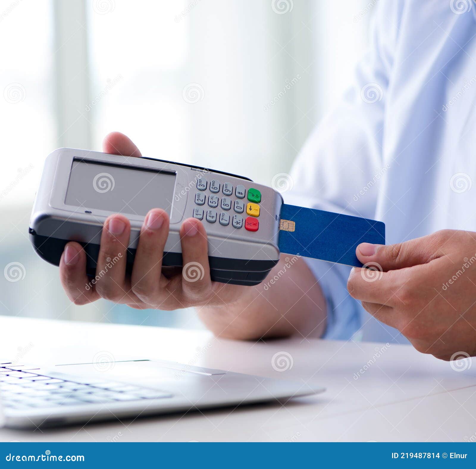 Man Processing Credit Card Transaction with POS Terminal Stock Photo ...