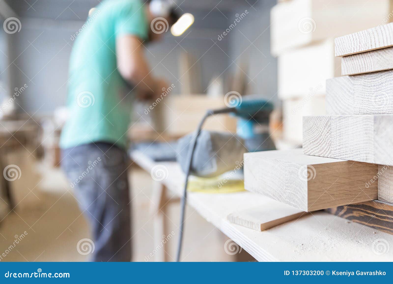 A Man is Processing a Tree. Joiner. a Carpenter. Woodworking Processes ...