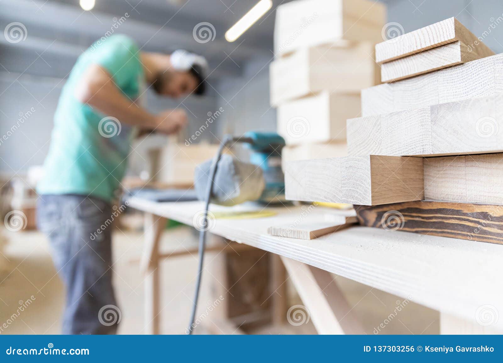 A Man is Processing a Tree. Joiner. a Carpenter. Woodworking Processes ...