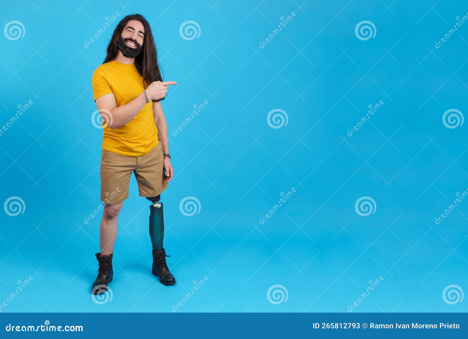Man with Prosthetic Leg Pointing To the Side Stock Image - Image of ...