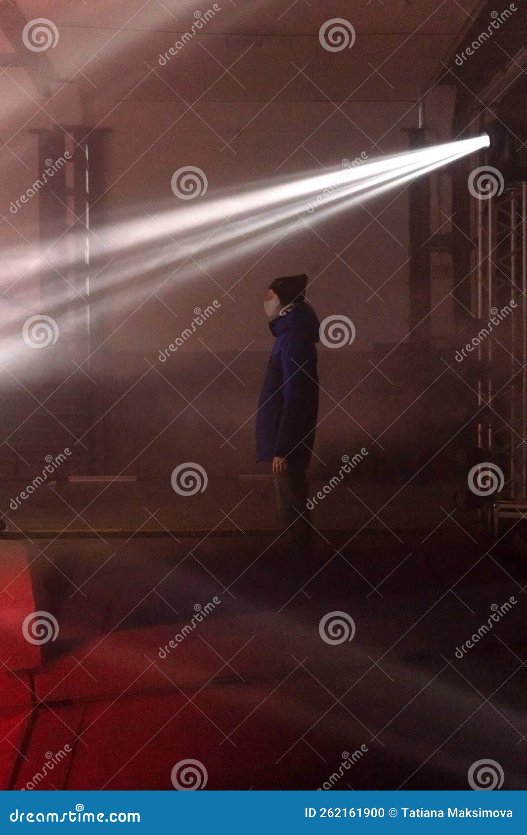Man in Protective Mask Stand in Neon Light Garage. Stock Photo - Image ...
