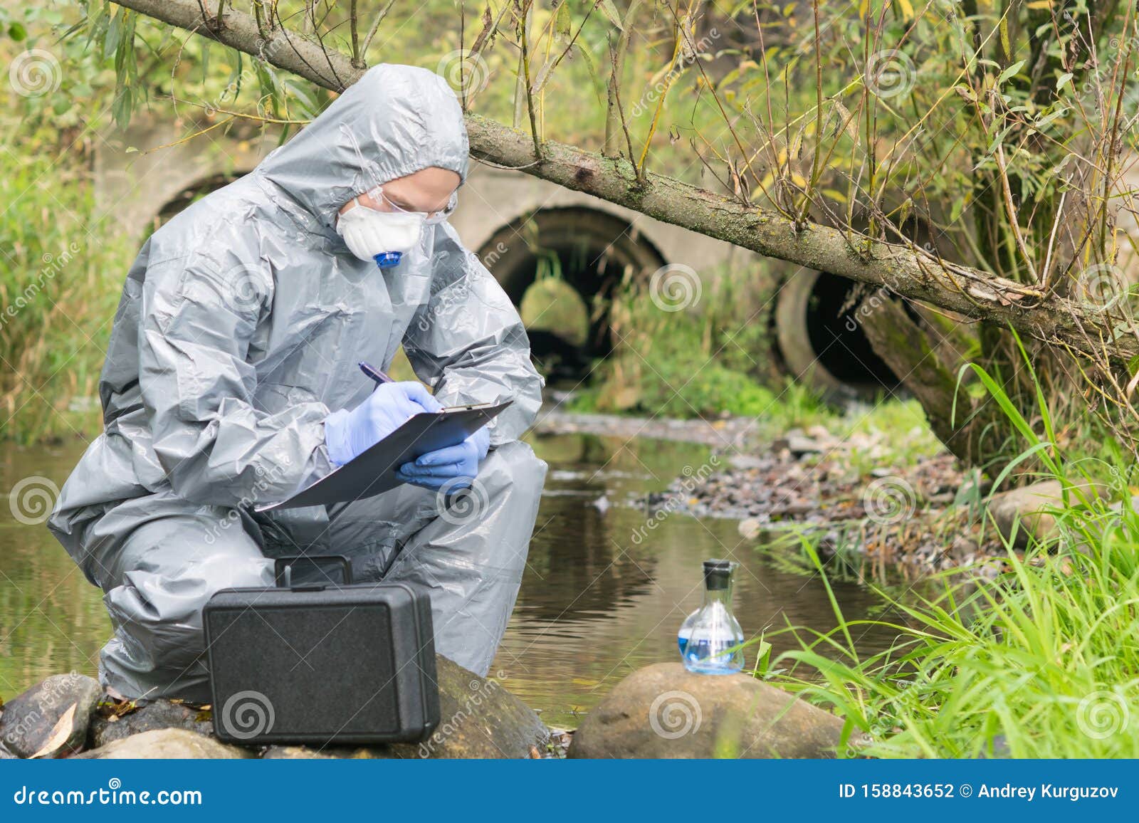 A Man in a Protective Suit Records Research on Environmental Pollution ...