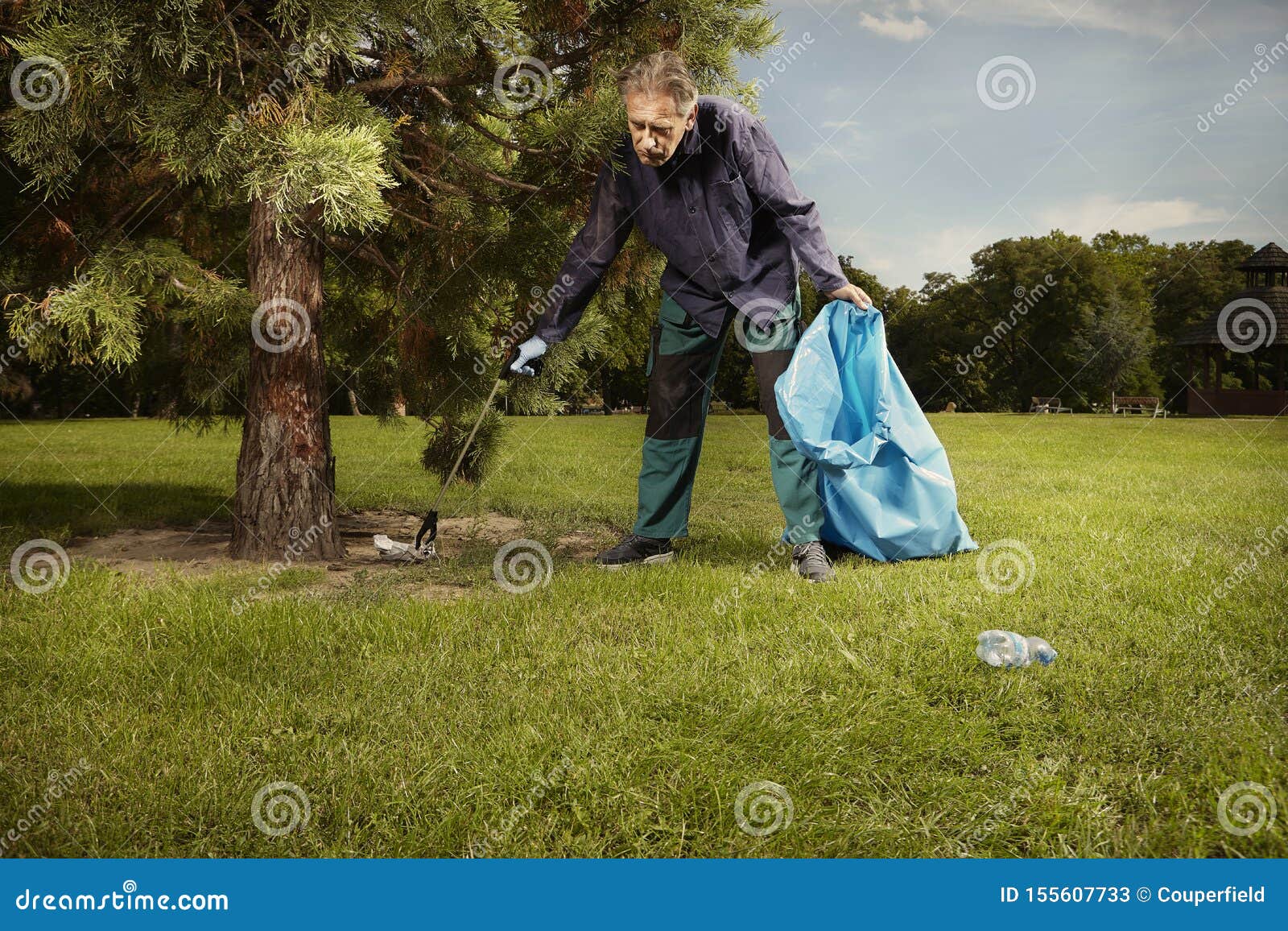 Man at Work Pick Up Garbage on Grass in Park Stock Image - Image of ...