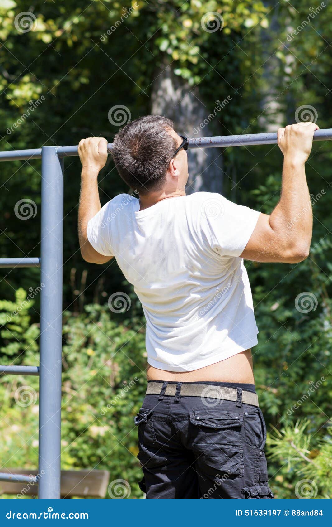 Man Pull Up in a Park.STREET WORKOUT Stock Image - Image of muscle ...