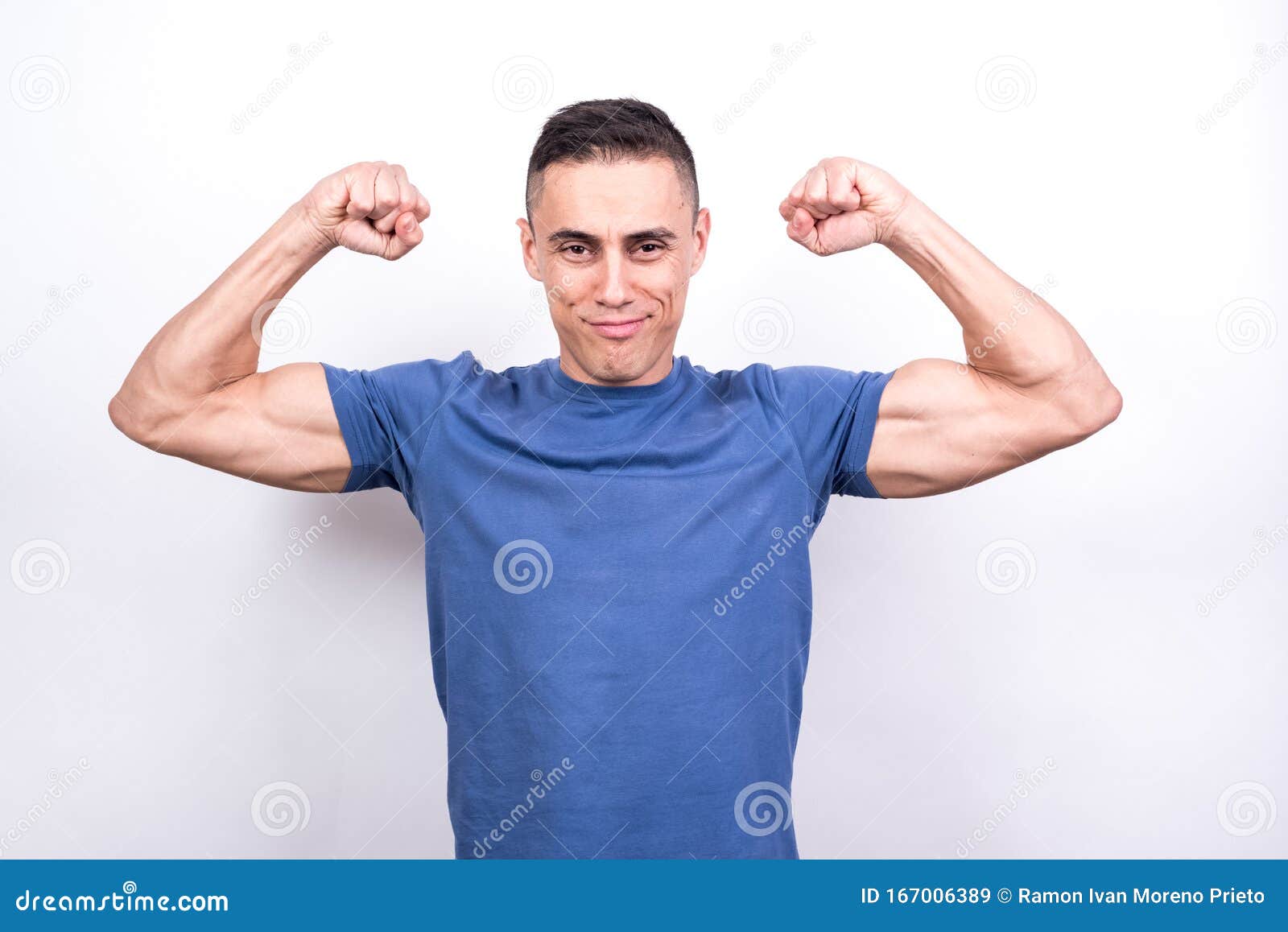 Man pulling out biceps stock image. Image of middle - 167006389