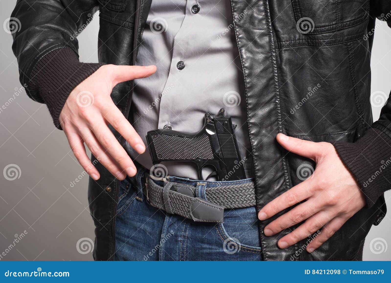 Man Pulling Out a Gun Ready Stock Photo - Image of holster, black: 84212098