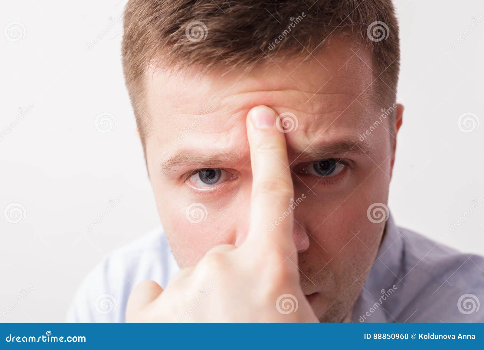 Man Pulls His Finger in Forehead Stock Photo - Image of range, studio ...