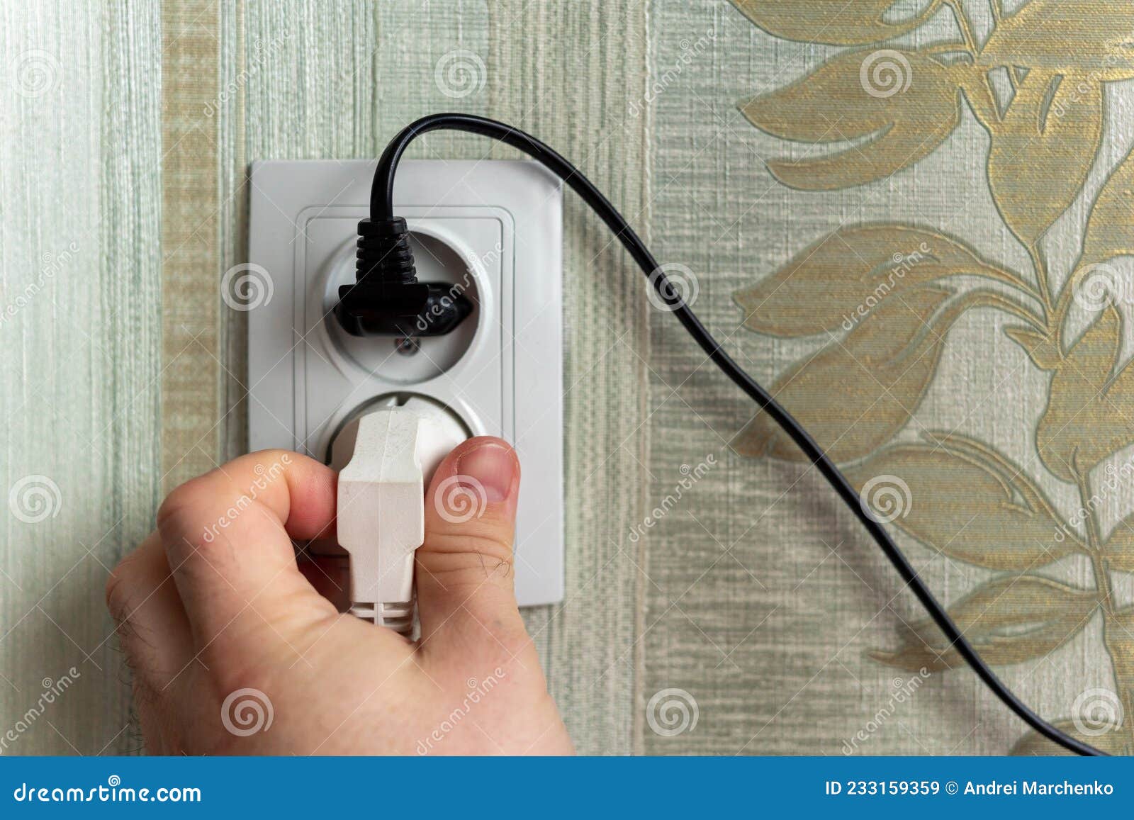 Man Pulls the Plug Out of an Electrical Outlet Stock Image - Image of ...