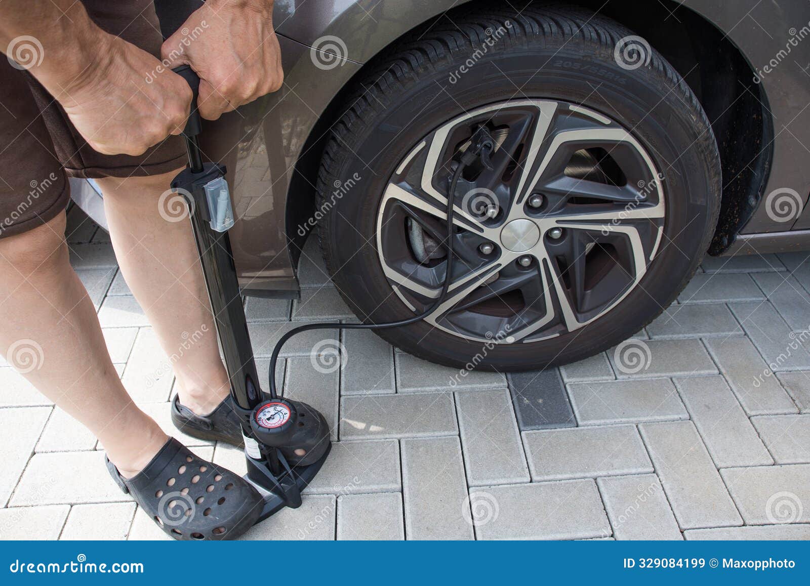Man is Pumping the Car with Hand Pump Stock Image - Image of pumping ...
