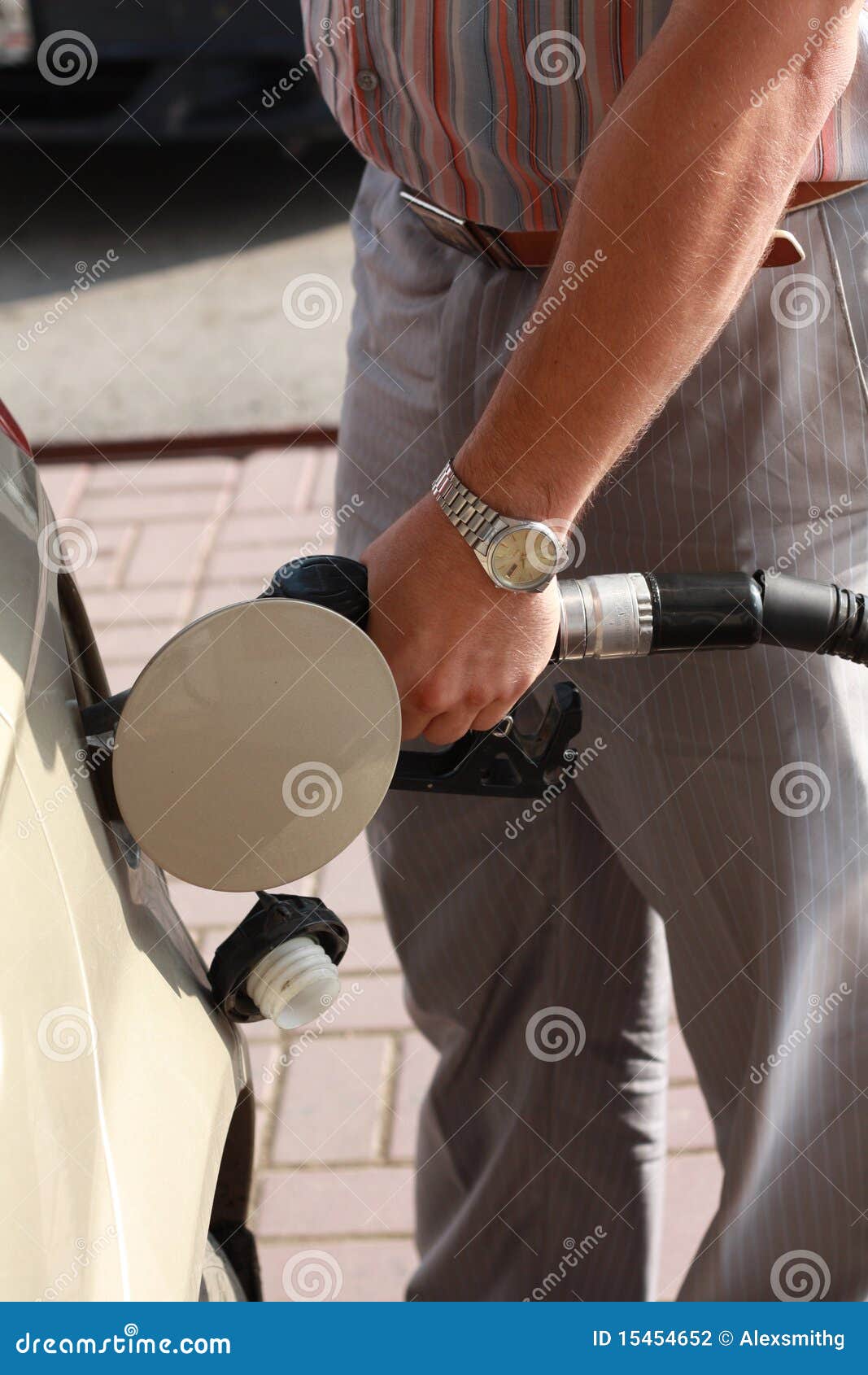 Man pumping gas stock photo. Image of hand, adult, hold - 15454652