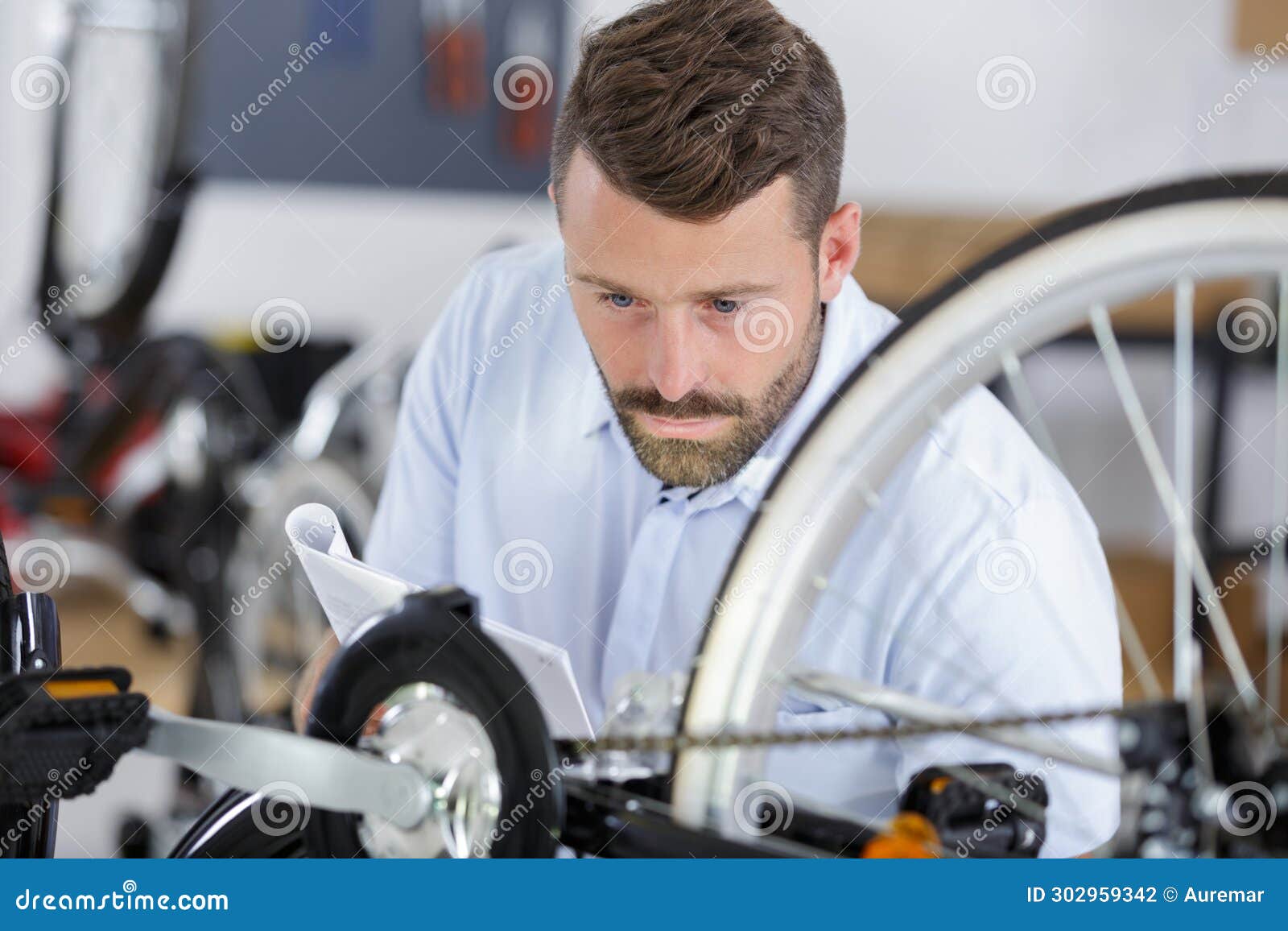 Man pumping wheel bike stock photo. Image of outdoor - 302959342