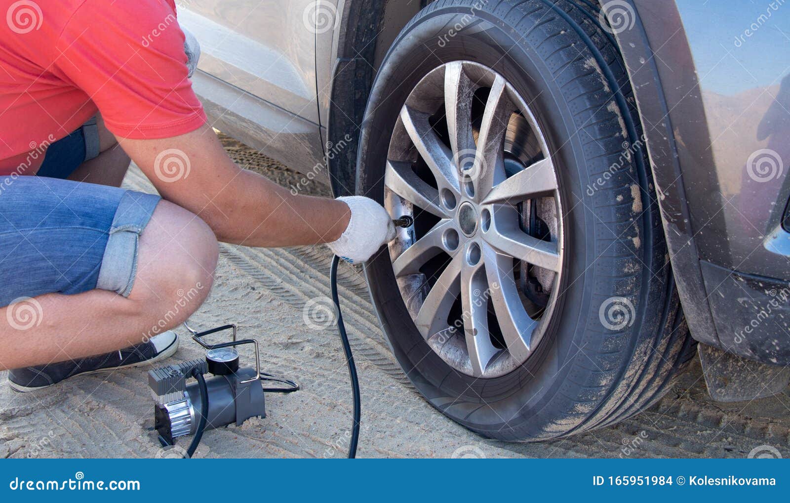The Man Pumps Up the Wheel. Stock Photo - Image of auto, investigate ...