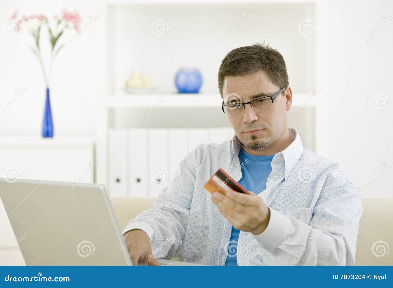 Man Purchasing by Credit Card Stock Photo - Image of home, comfort: 7073204
