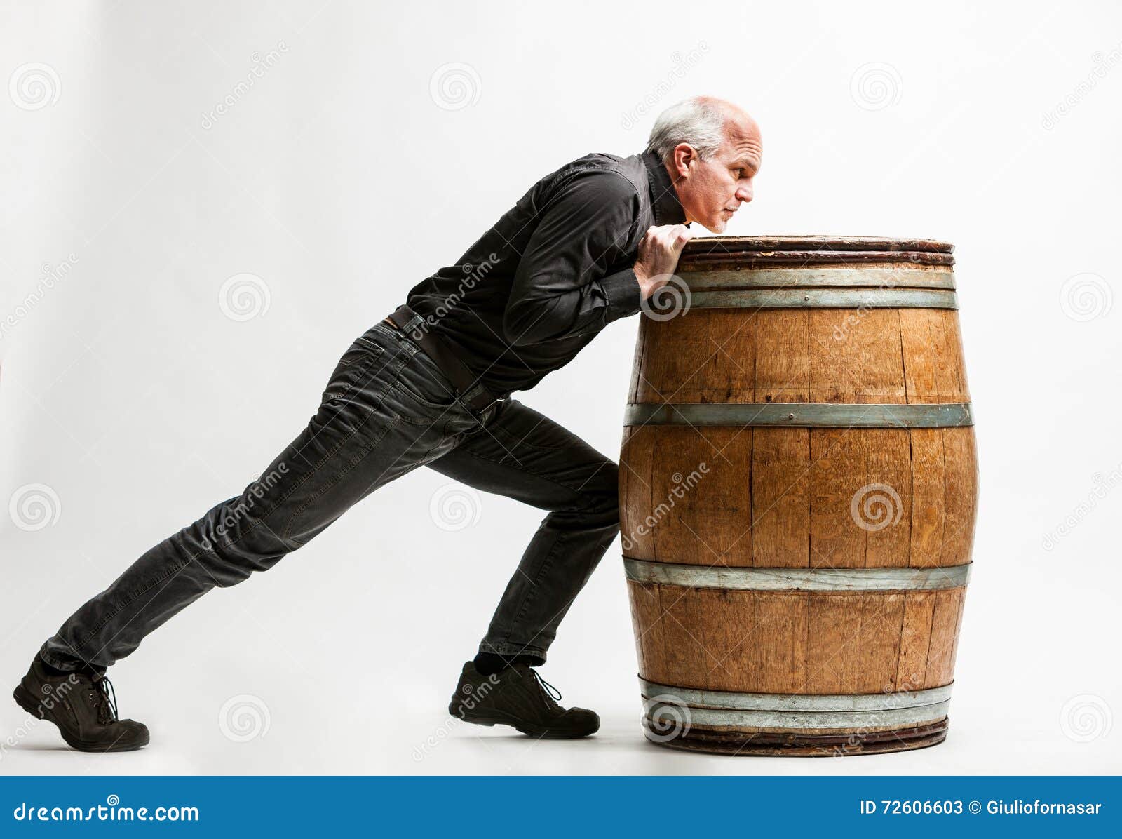 Man Pushing a Barrel Very Resolute Stock Image - Image of culture ...