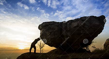 Man Pushing a Boulder on a Rock Stock Image - Image of metaphor ...