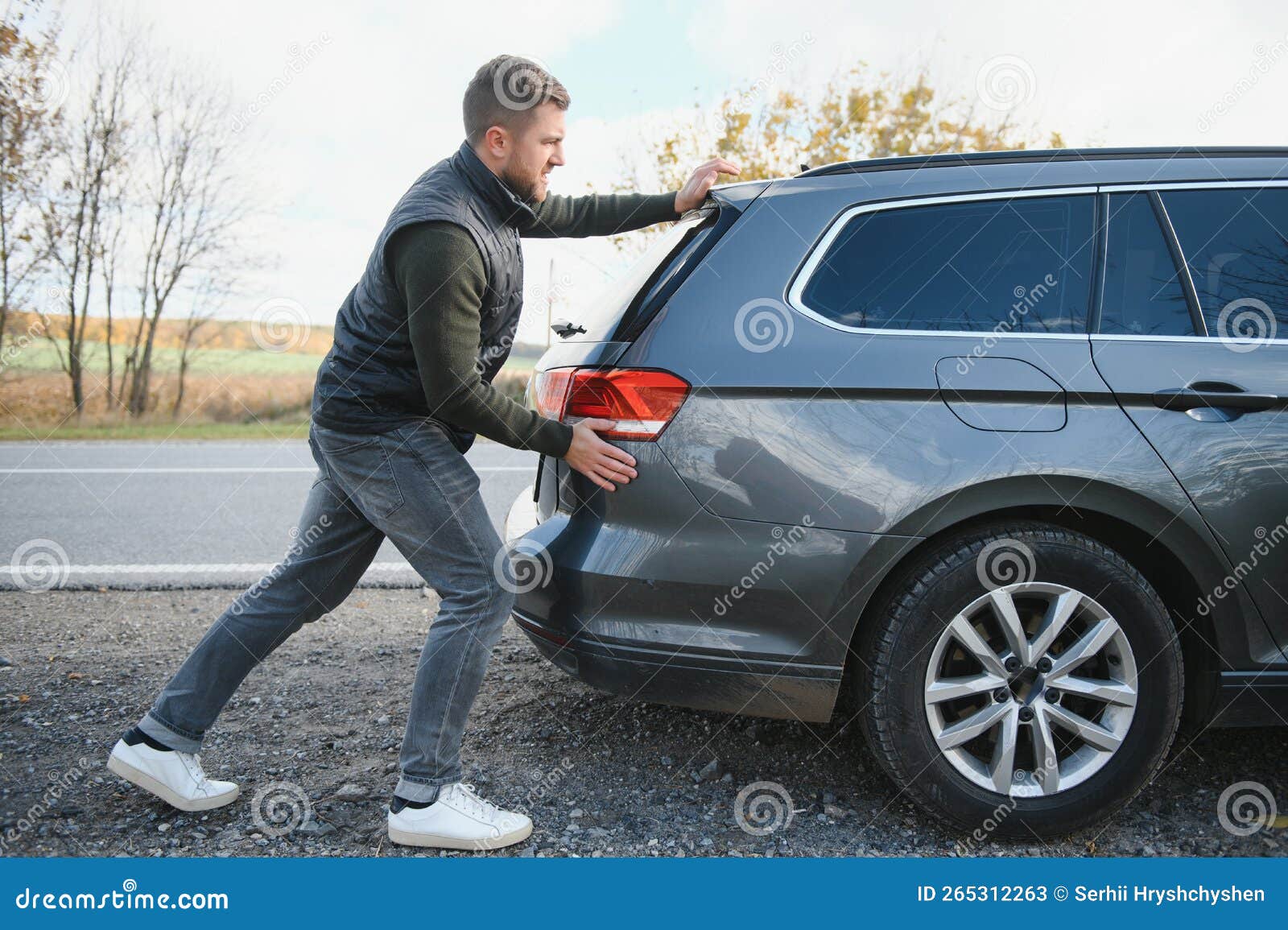 Man Pushing a Broken Car Down the Rock Road Stock Image - Image of ...
