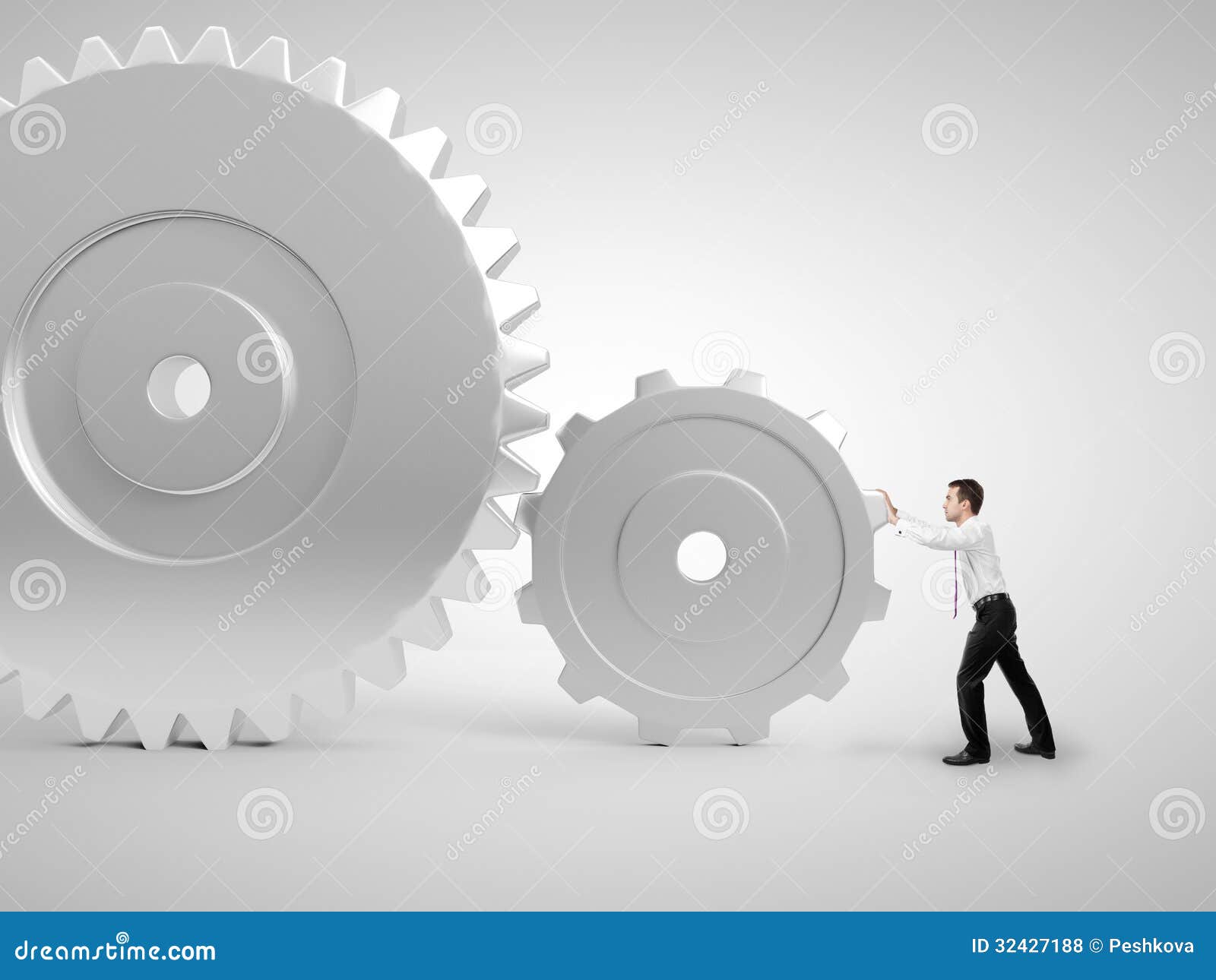 Man pushing gears stock photo. Image of clockwork, machine - 32427188