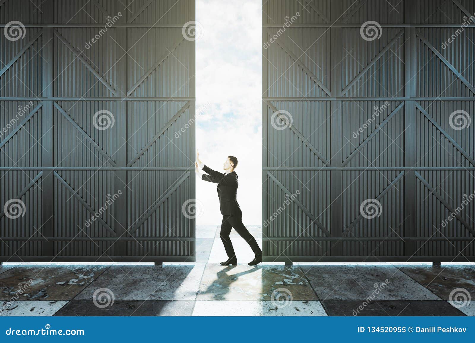 Man pushing hangar door stock image. Image of access - 134520955