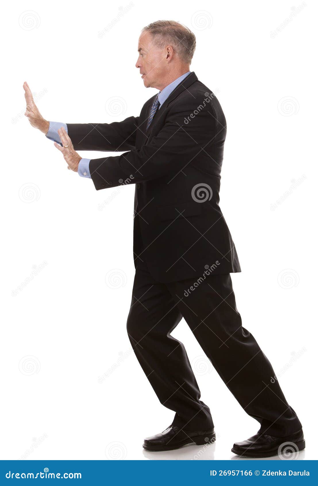 Man pushing an object stock photo. Image of portrait - 26957166