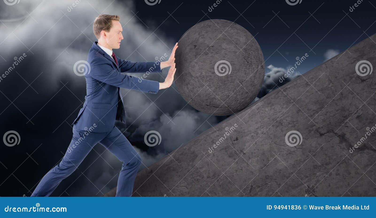 Man Pushing Rolling Round Rock Stock Photo - Image of caucasian ...
