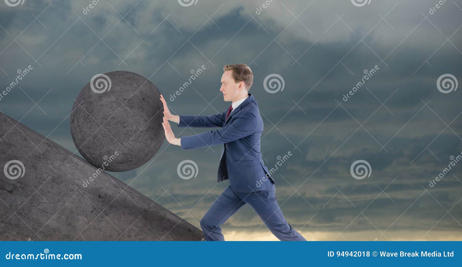 Man Pushing Rolling Round Rock Stock Photo - Image of caucasian ...