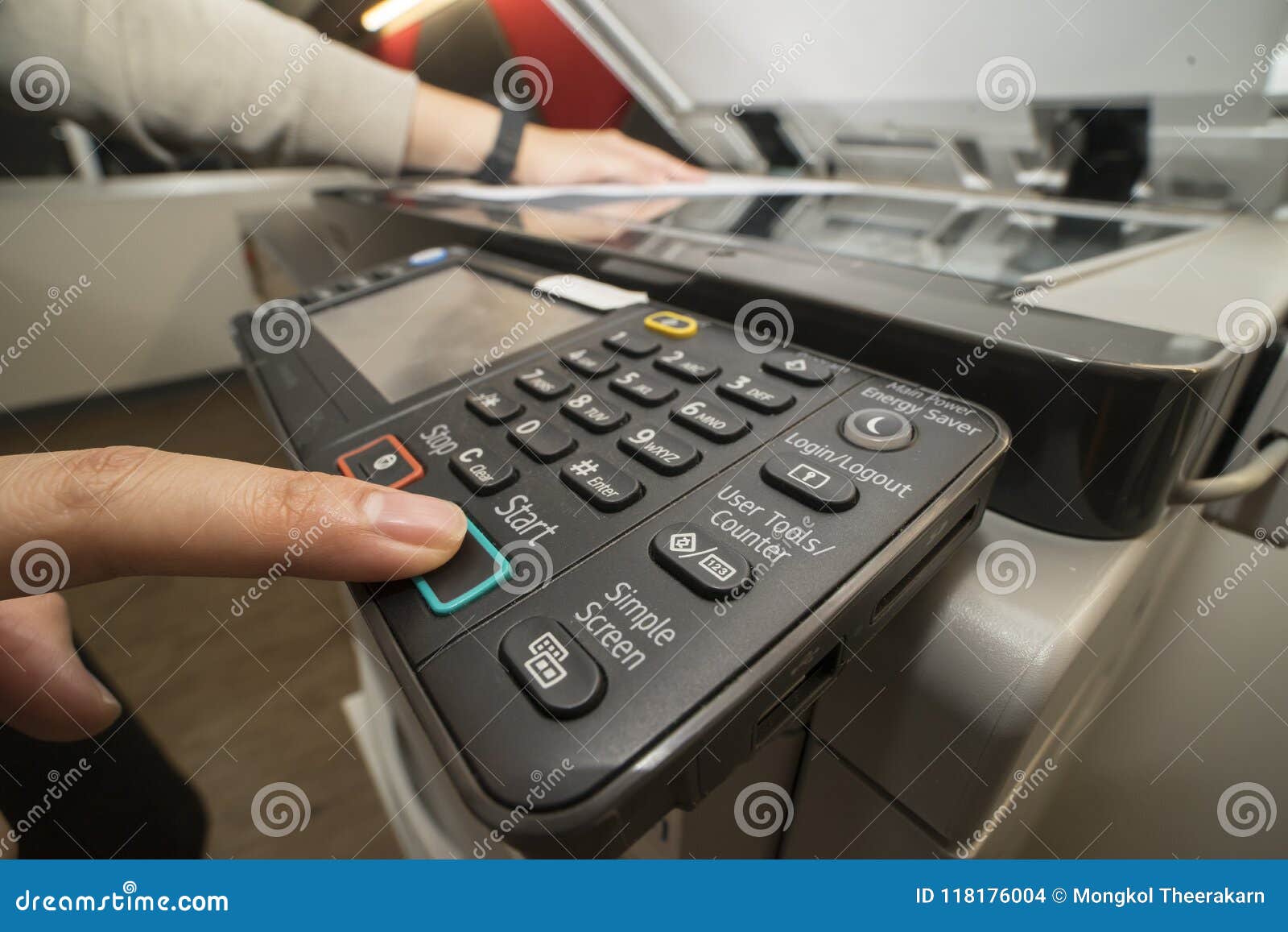 Man Pushing the Start Button of Photocopy Equipment for Document ...