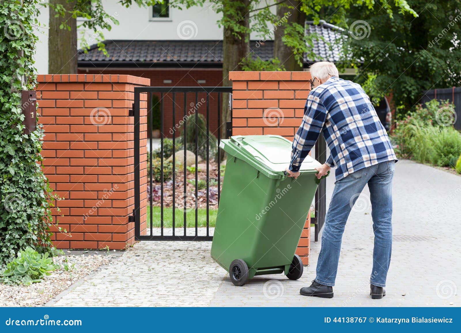 Man is Pushing Wheeled Dumpster Stock Image - Image of stink, charge ...