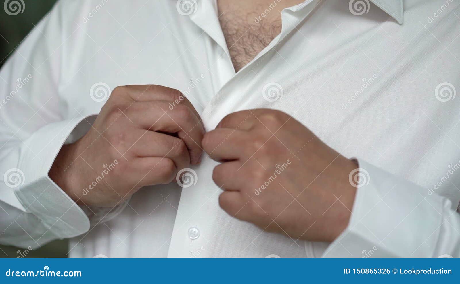 Man put on shirt stock footage. Video of fashion, button - 150865326