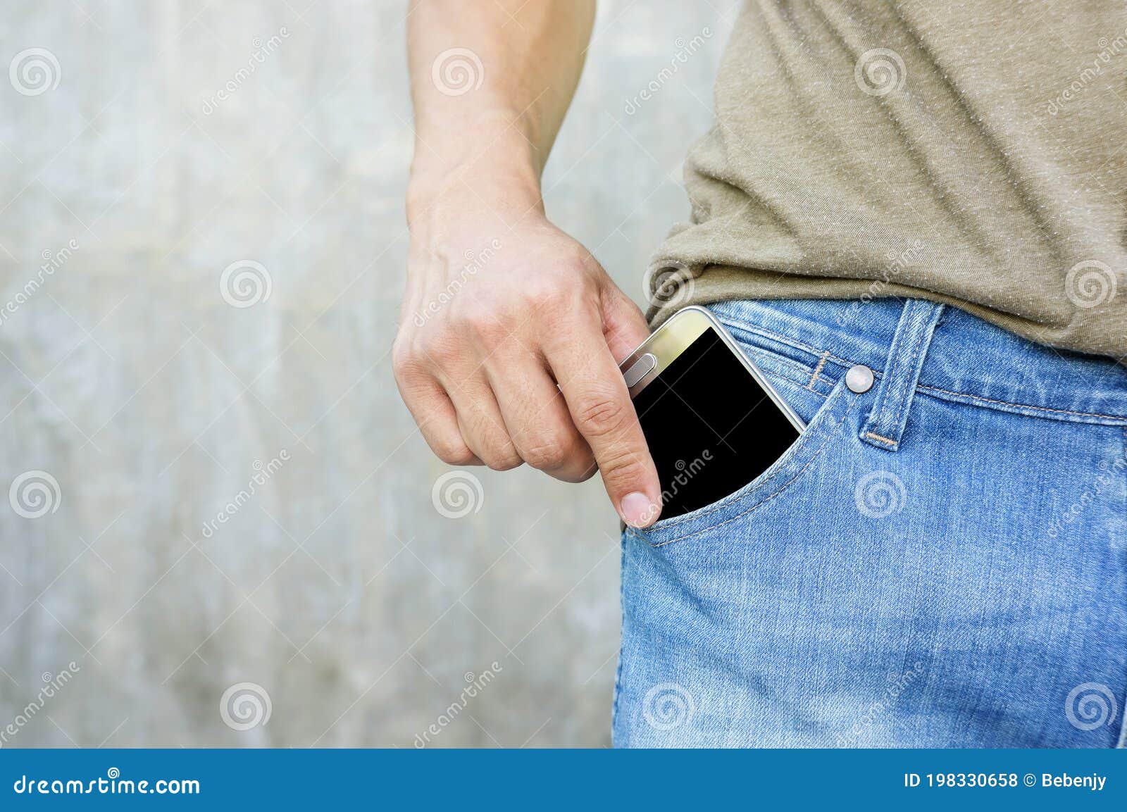 The Man Put a Smartphone in a Jeans Pocket Stock Photo - Image of phone ...