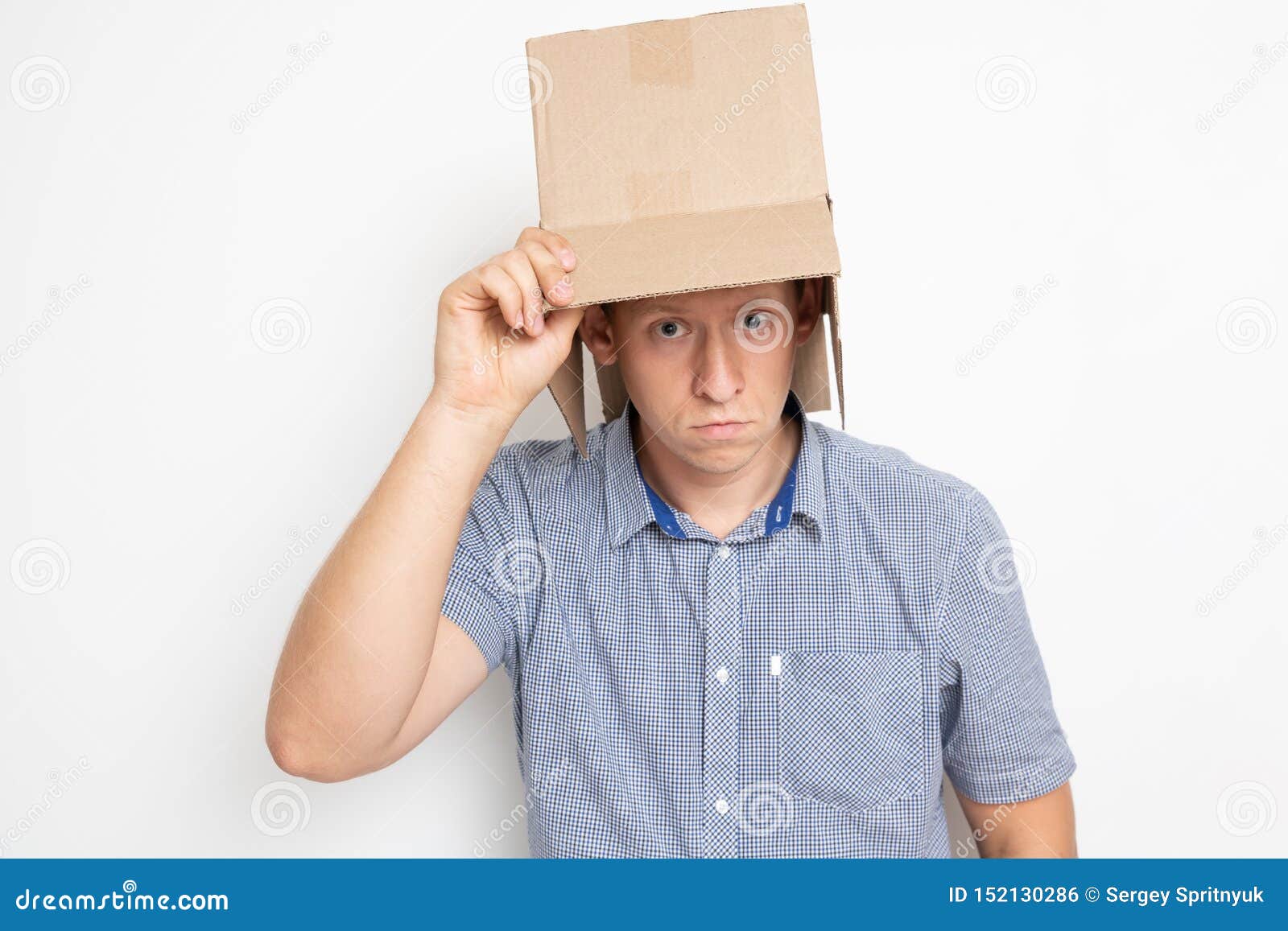 Man puts a bag on his head stock photo. Image of grin - 152130286