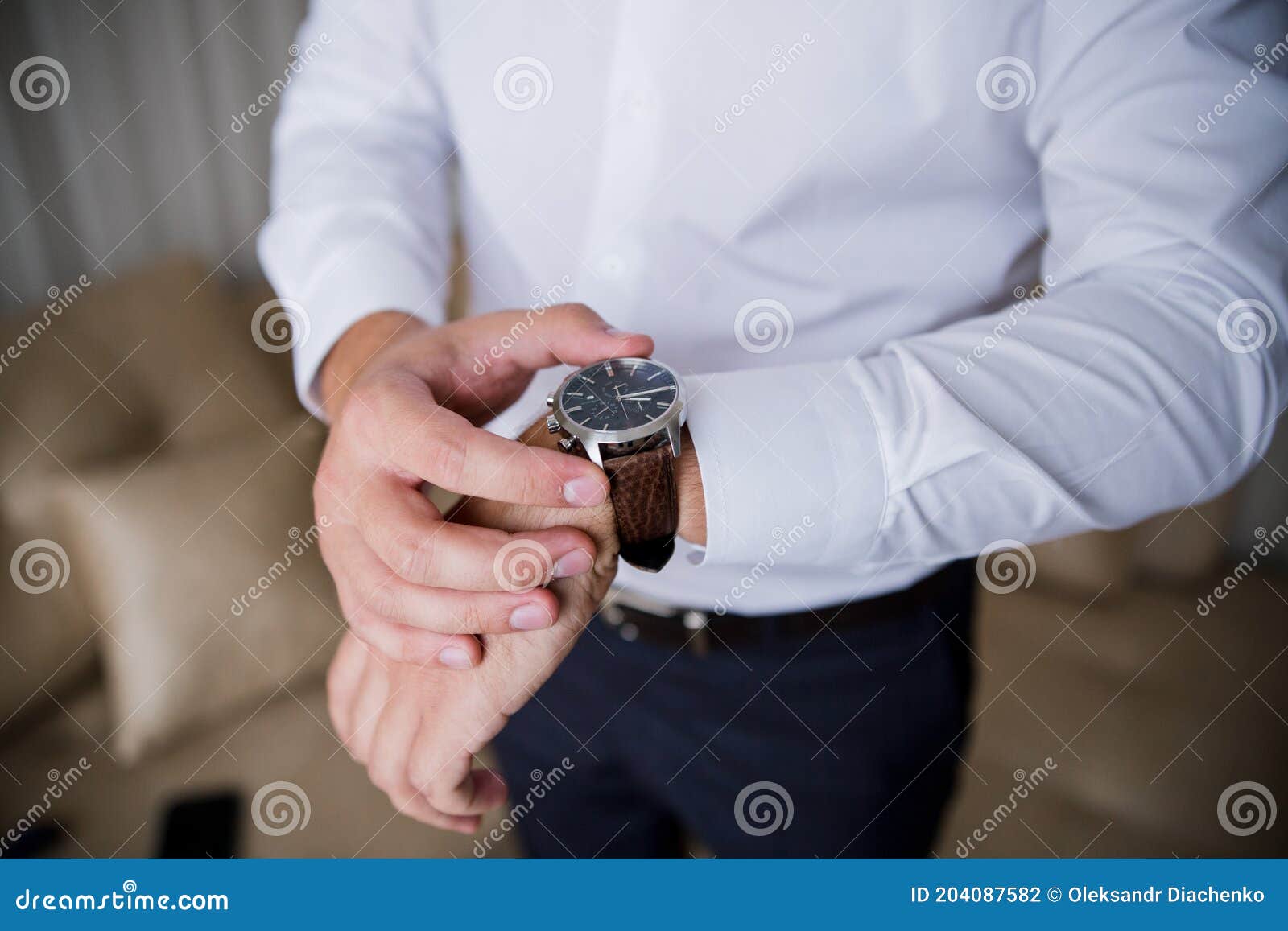 A Man Puts a Classic Watch on His Hand Stock Photo - Image of marriage ...
