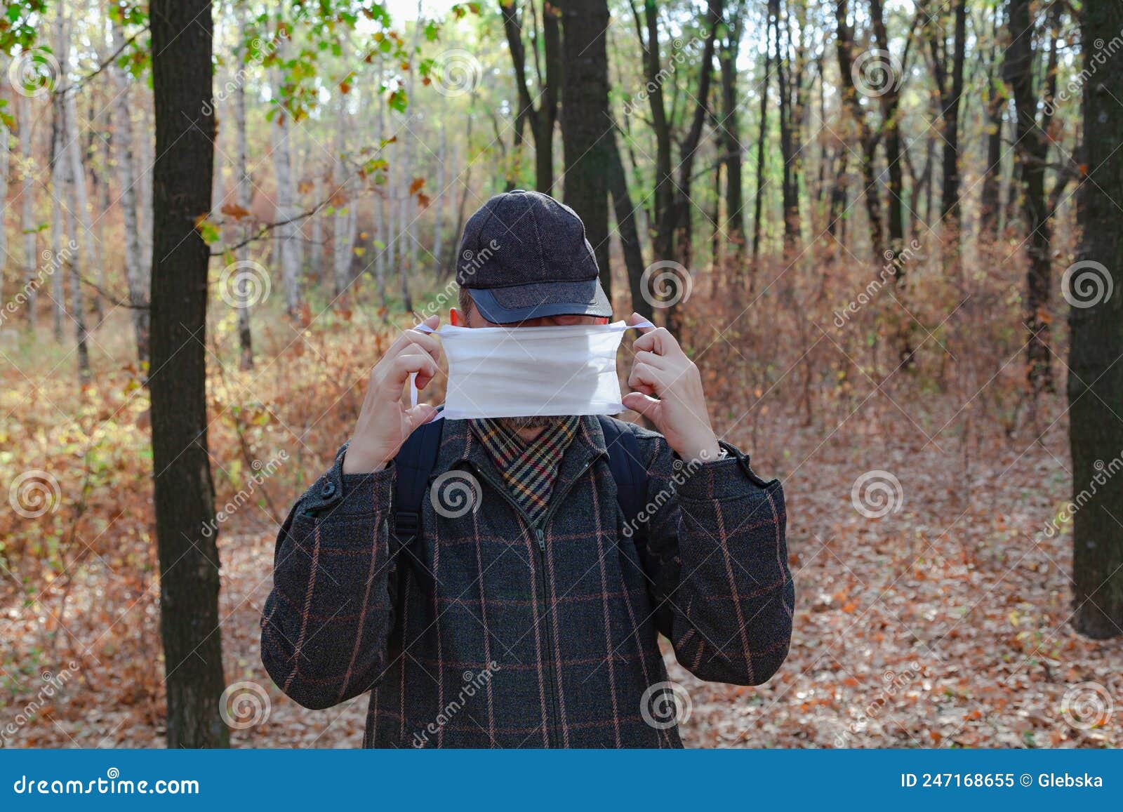 Man Puts on Protective Mask in Nature Stock Image - Image of ...