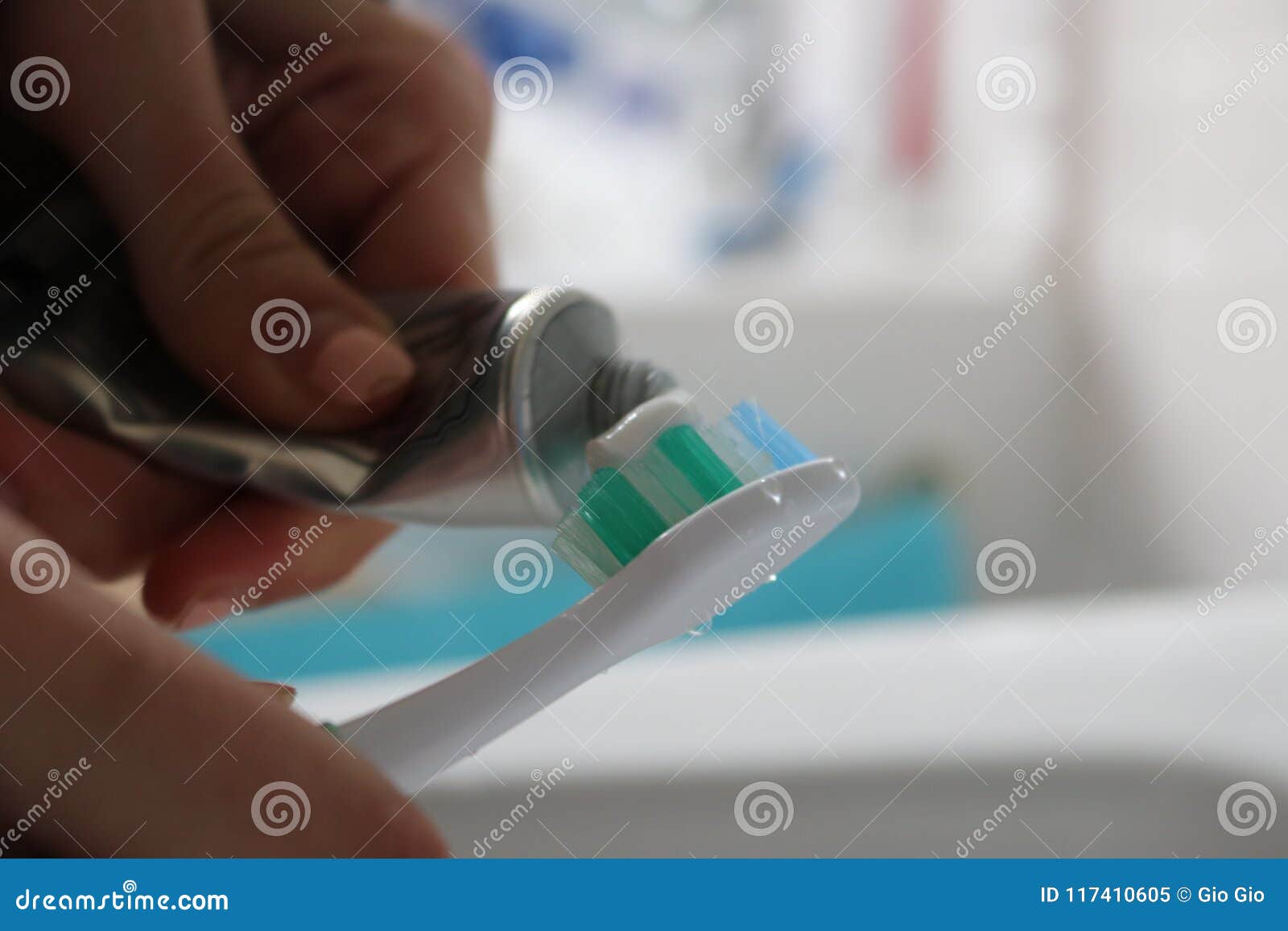 Man Puts Toothpaste on Toothbrush Stock Image - Image of morning, clean ...