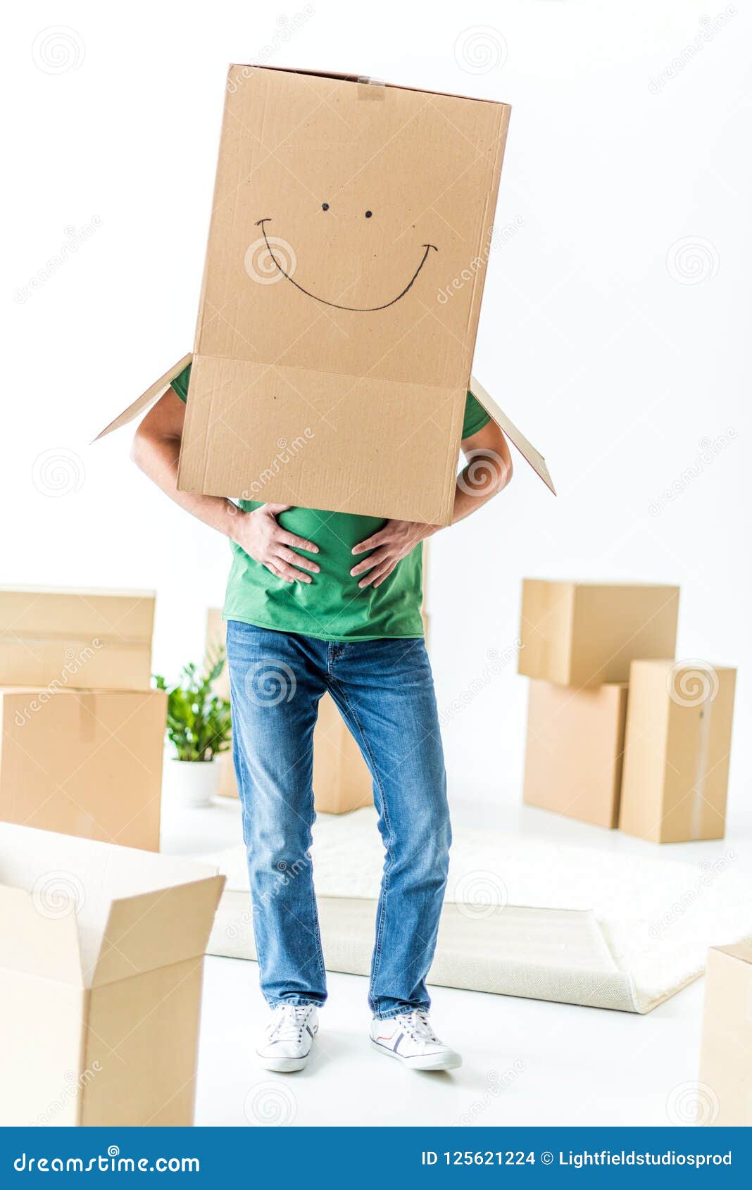 Man with cardboard box stock photo. Image of person - 125621224
