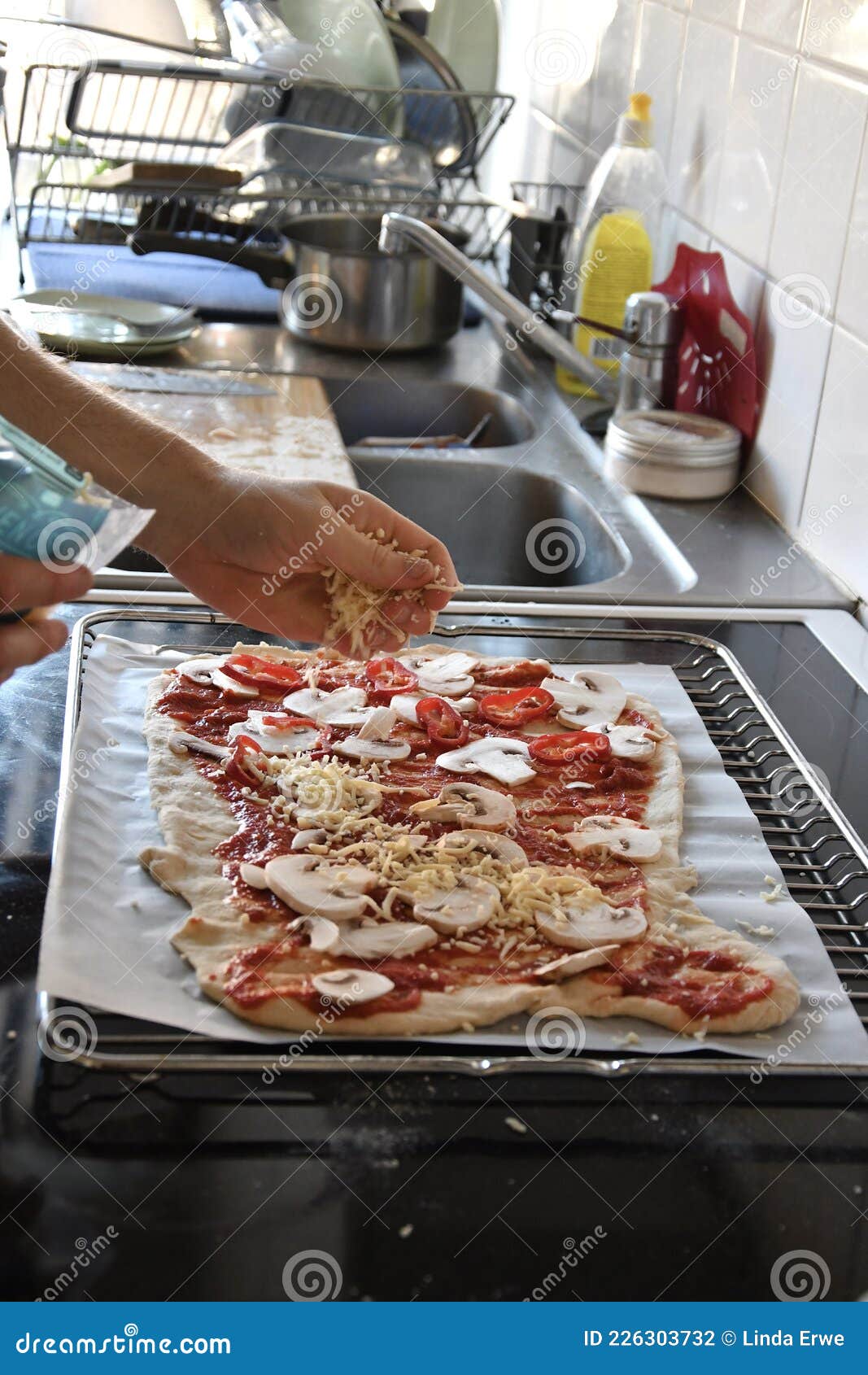 A Man Putting Cheese on Pizza, Cooking Food Stock Photo - Image of ...