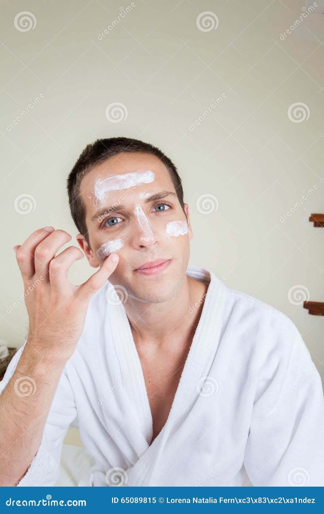 Man putting on face cream stock image. Image of applying - 65089815