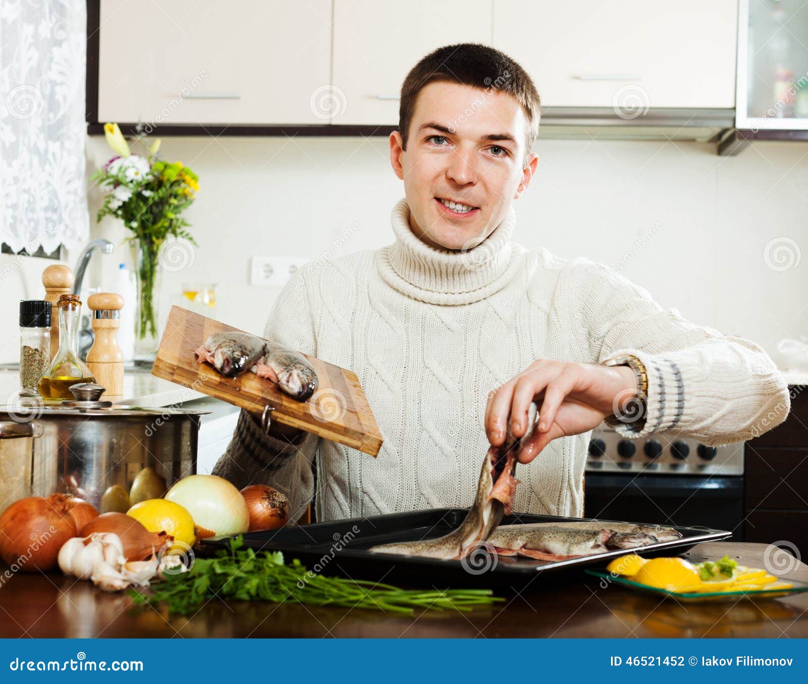 Man Putting Freshwater Fish into Sheet Pan Stock Photo - Image of happy ...