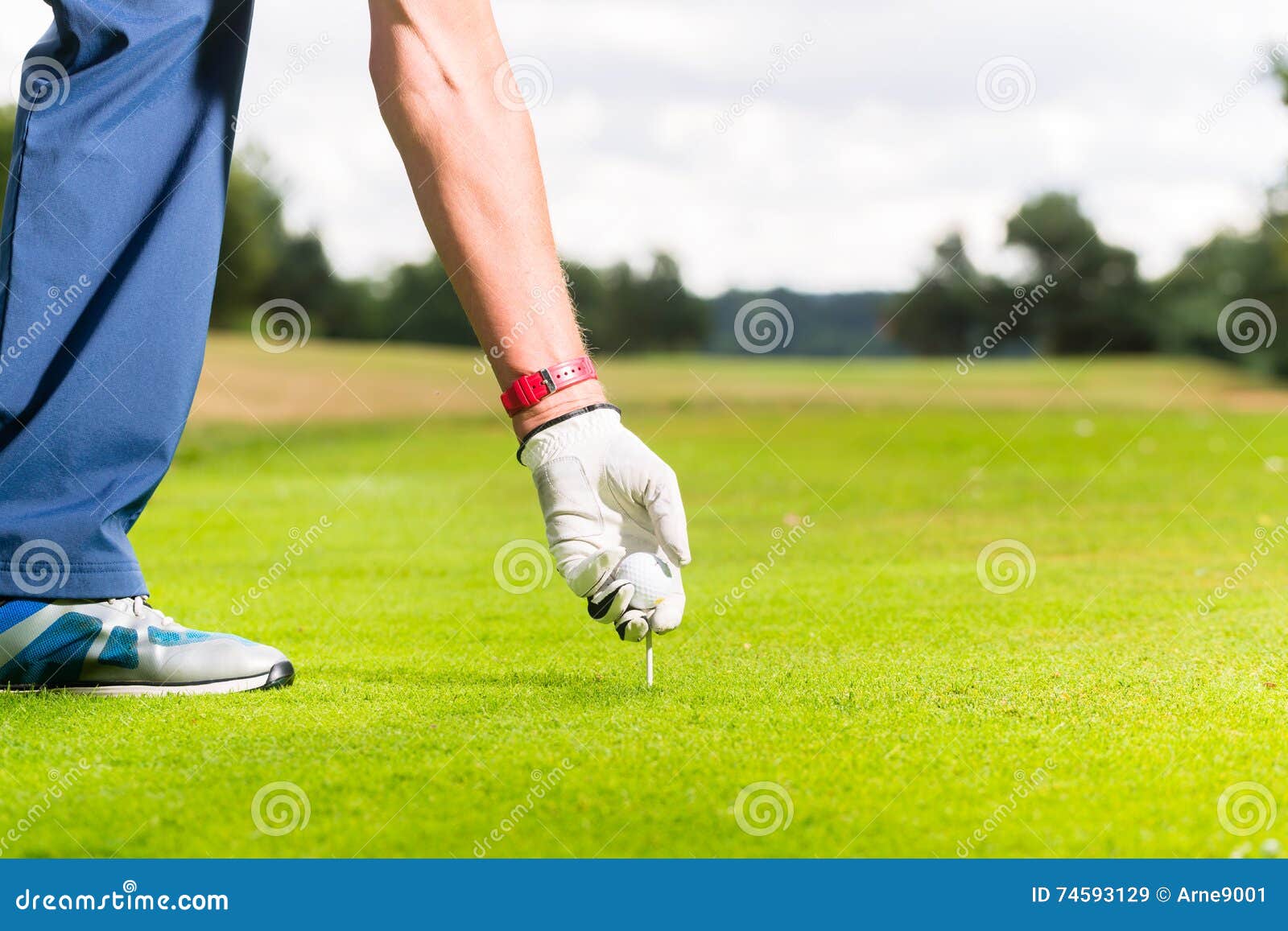 Man Putting Golf Ball on Tee, Close Shot Stock Image - Image of person ...