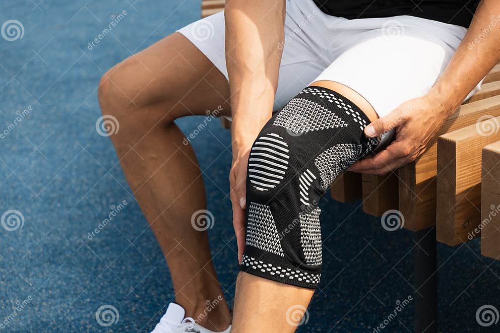 Knee Support Brace On Male Legs Outdoors In Summer Stock Image Image Of Sport Exercise