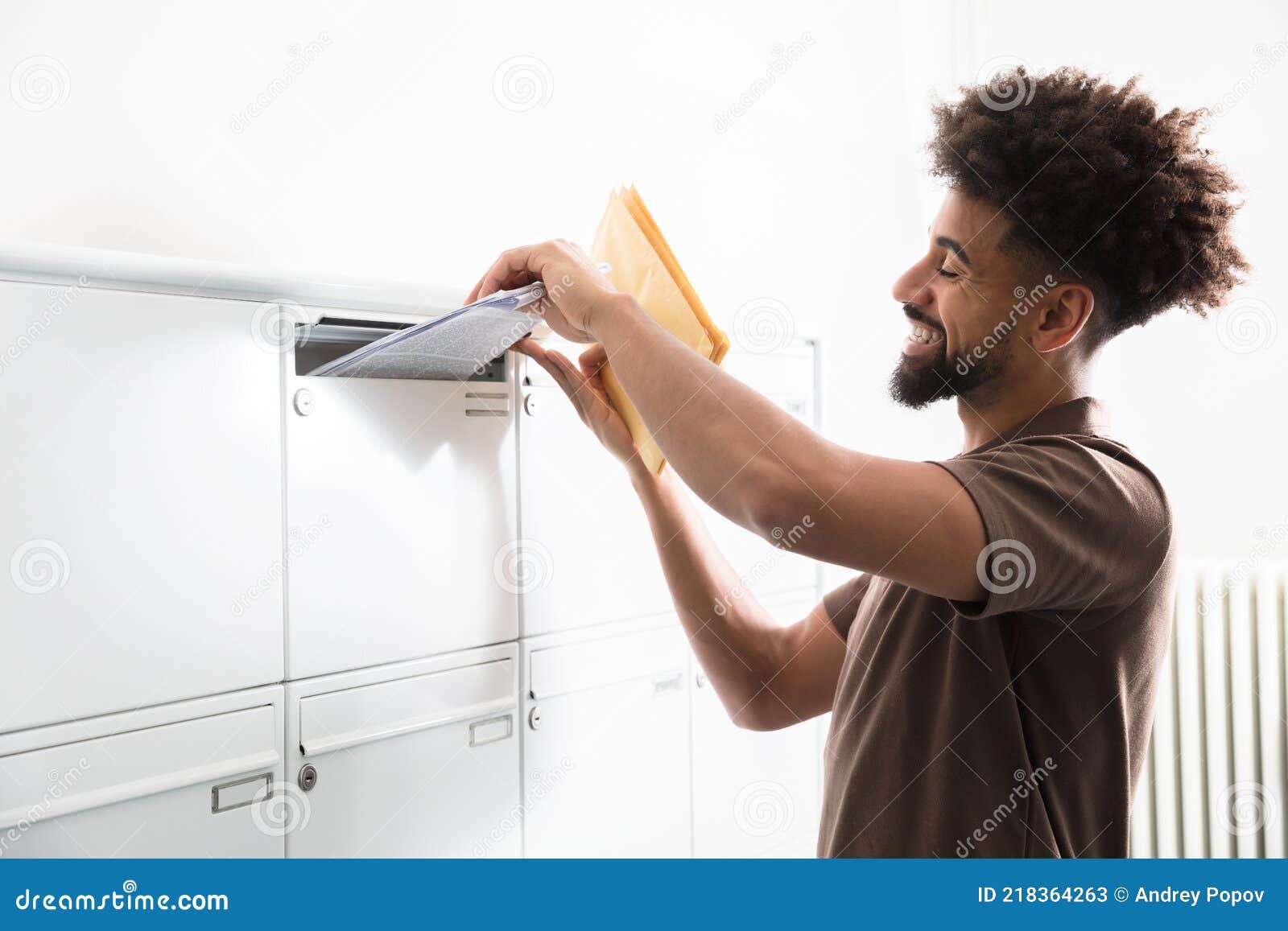 Man Putting Letters in Mailbox Stock Image - Image of message, happy ...