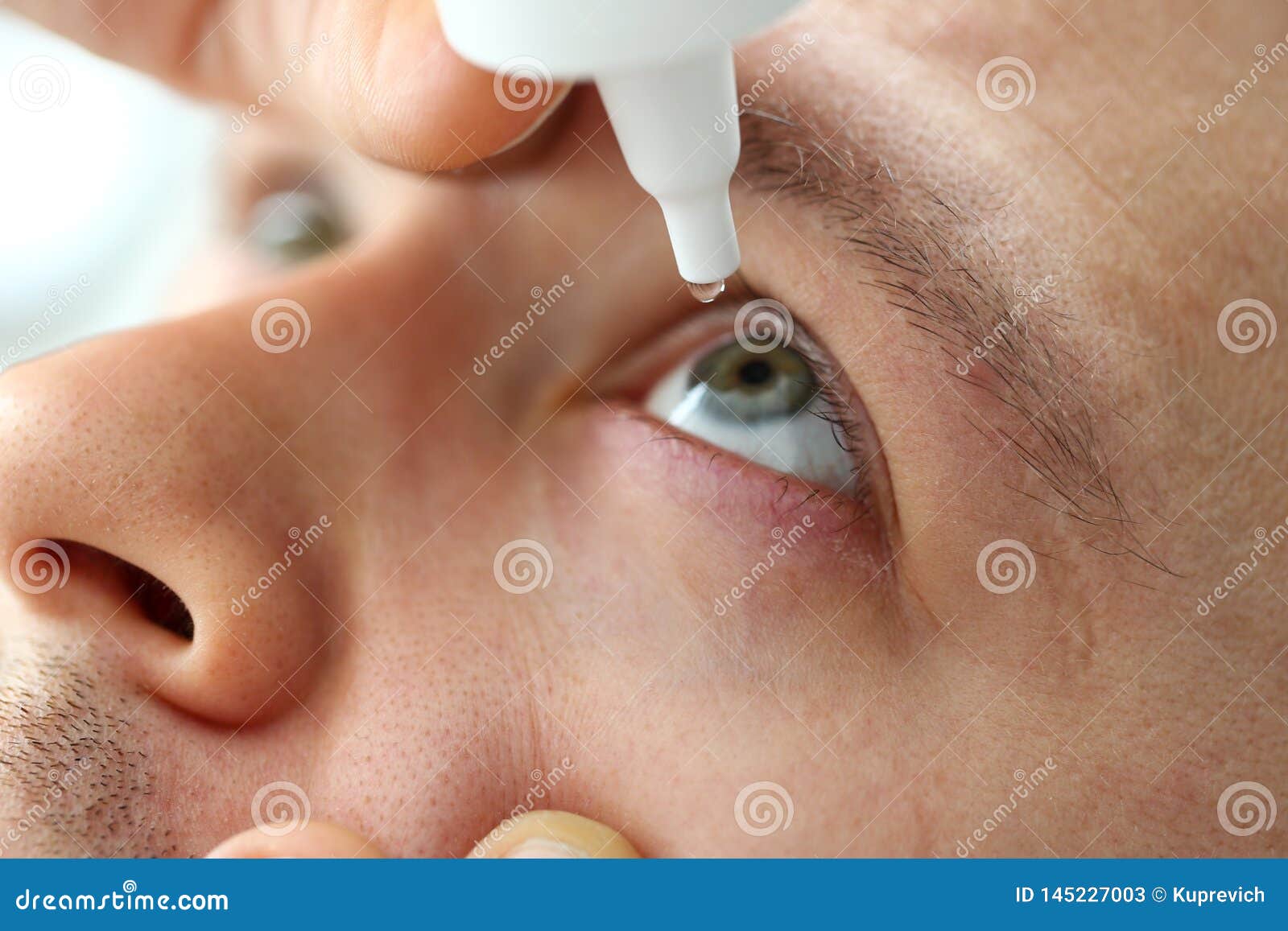 Man Putting Liquid Drops in His Eye Solving Vision Problem Stock Image ...