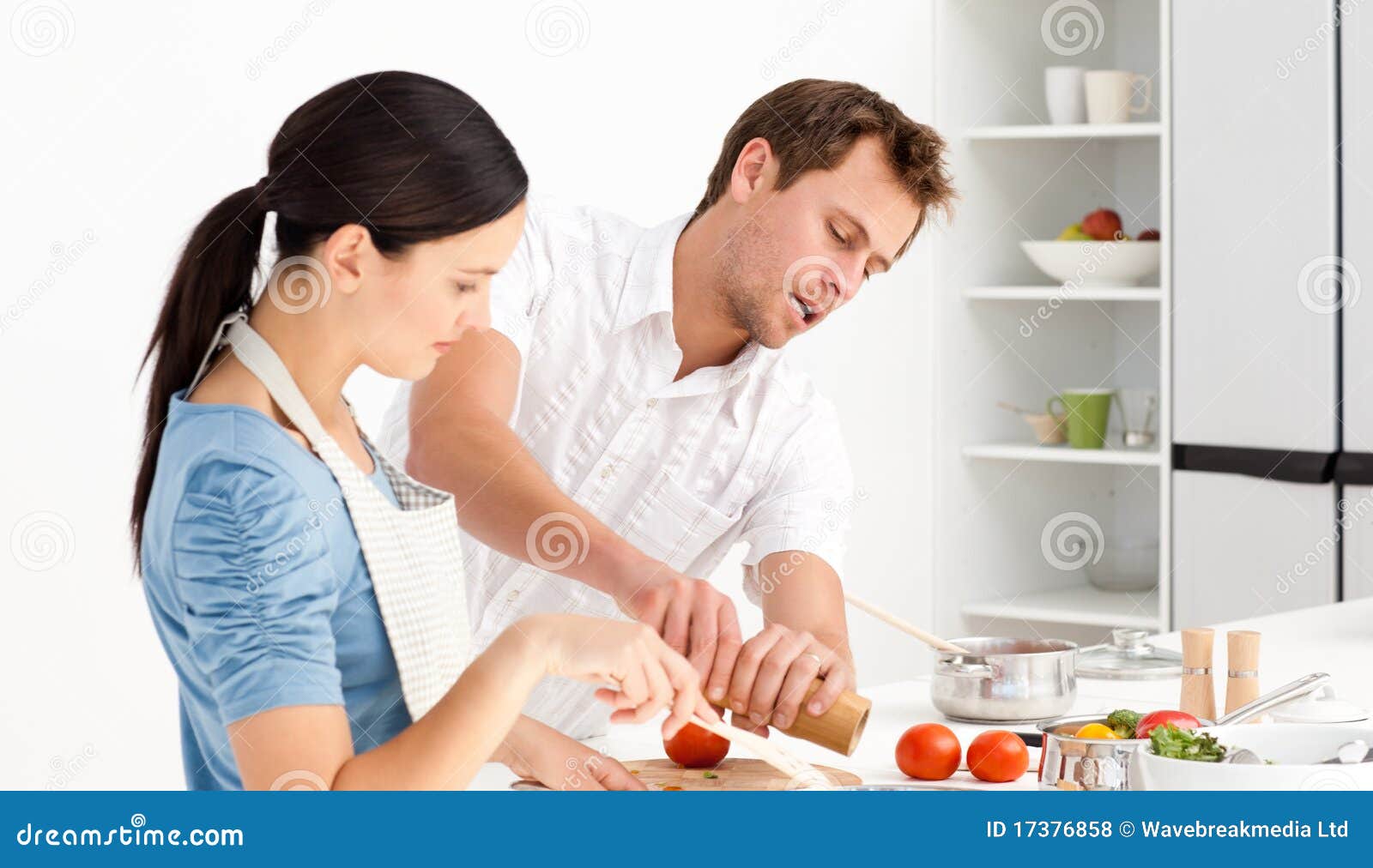 Man Putting Salt and Pepper with His Wife Stock Photo - Image of food ...